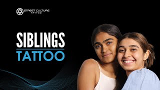 Sisters getting tattoo from Street Culture Tattoo