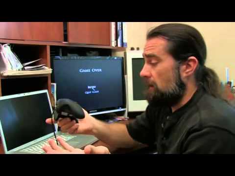 Logitech Dou gamepad controller to playing video games on a personal computer either Windows ...