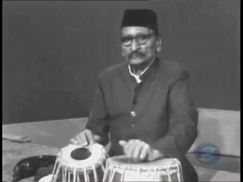 Discussion of gharanas and tabla demonstration by Ustad Ahmedjan Thirakwa with English ...
