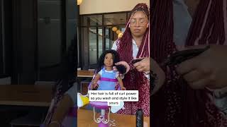 This black doll’s natural hair is full of curl power ????