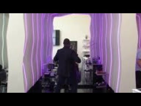 High-tech salon offers private pods, movies and Alexa