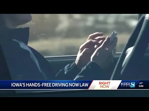 Iowa Gov. Kim Reynolds signs hands-free driving bill into law