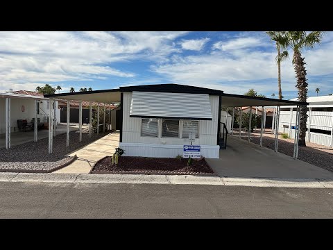 SOLD—$50,999 for sale 14x64 mobile home in a 55+ community located in Apache Junction, Arizona