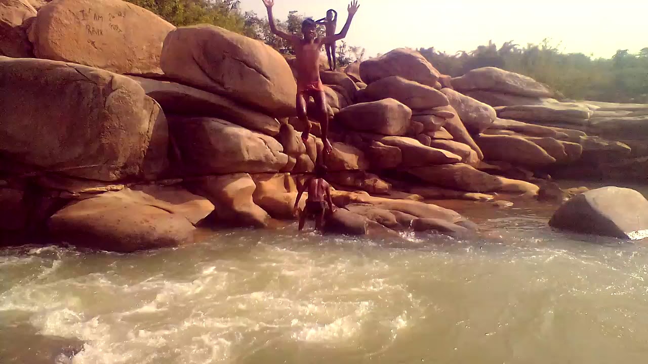 Bathing in river three boys