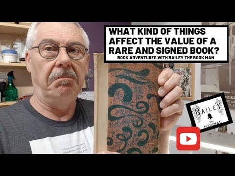 What kind of things affect the value of a rare and signed book?