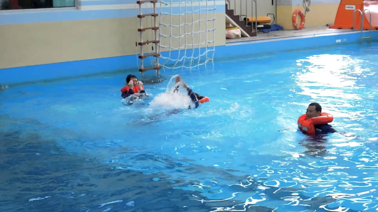 Back Swimming with life jacket.
