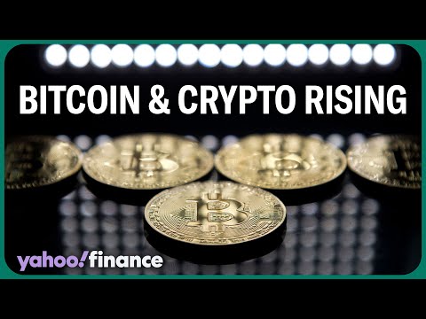 Bitcoin hovers near record high of $72,000, fueling crypto gains
