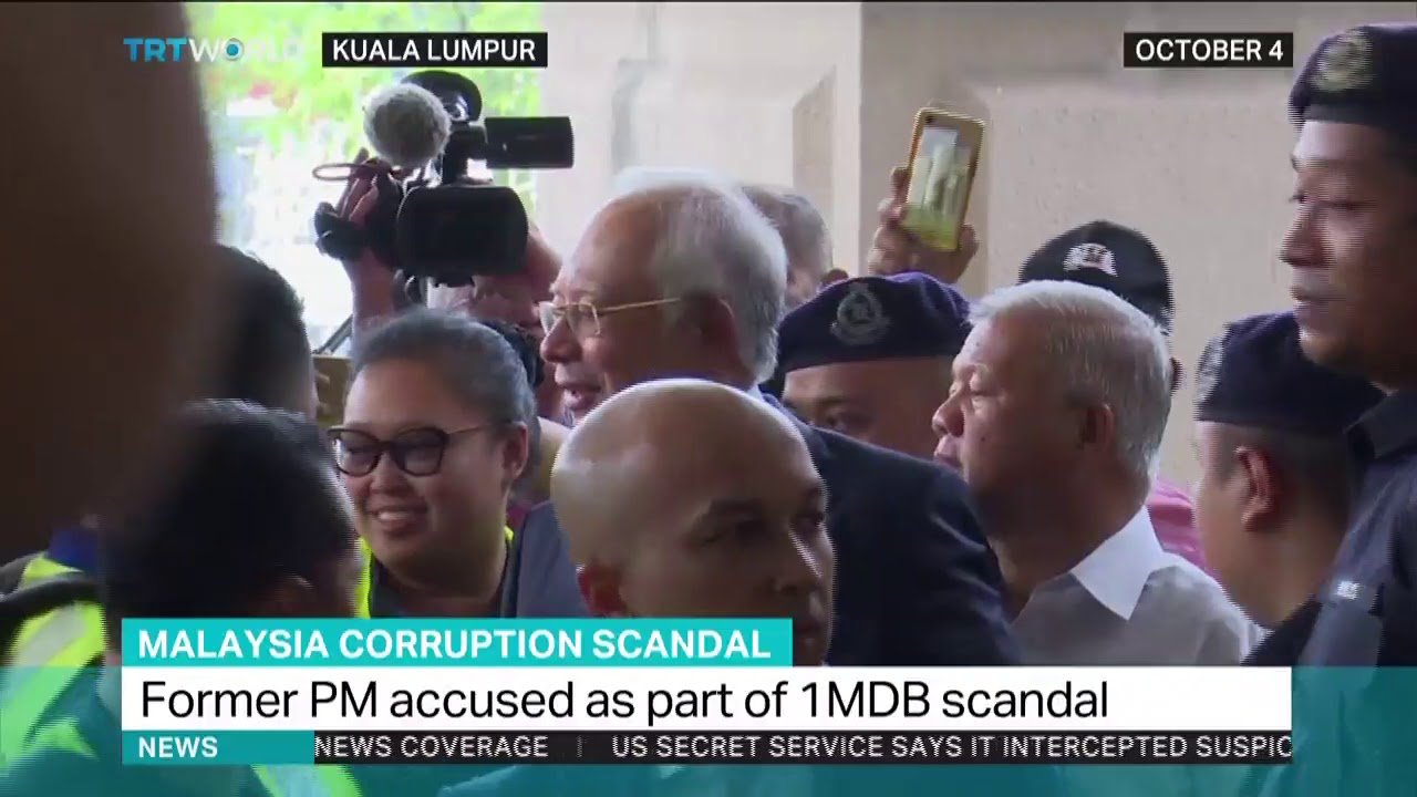 Malaysian ex-PM, treasury head charged in graft case