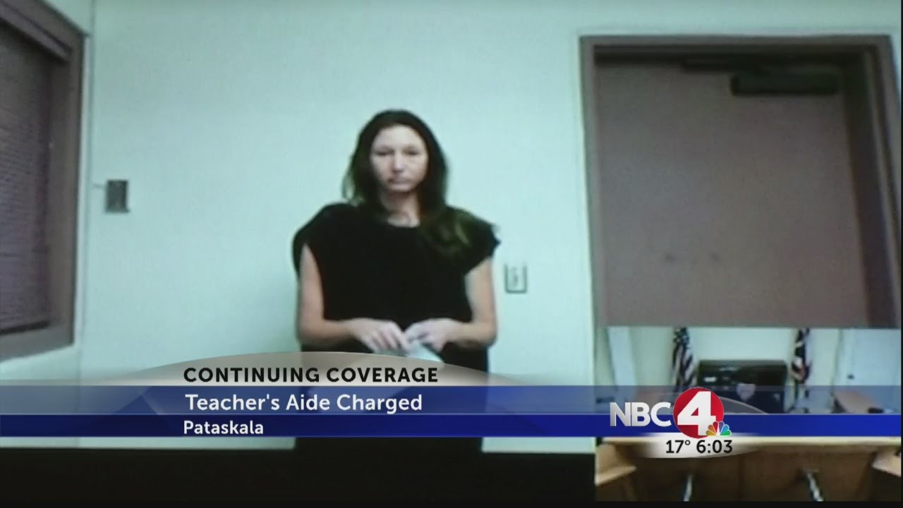 Teacher's aide charged