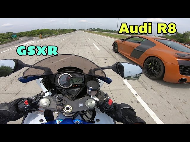 Audi R8 Races Motorcycles