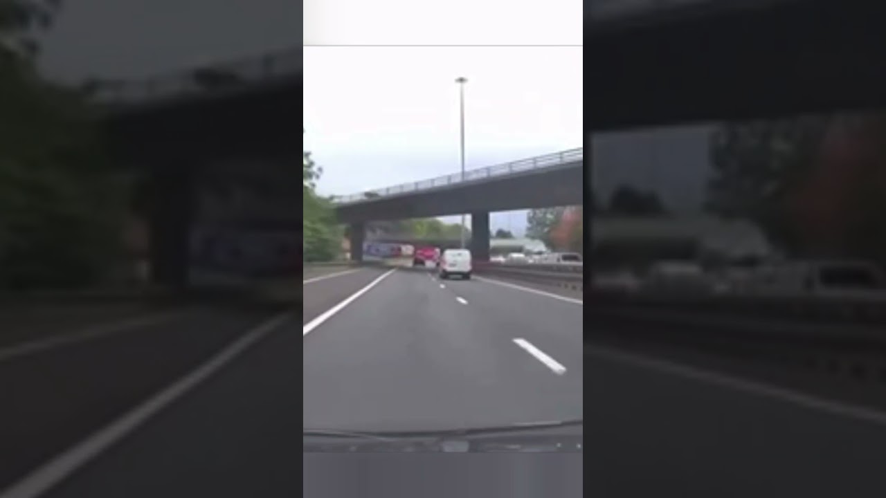 Footage captures terrifying moment Glasgow lorry crash sends load of wood crashing onto M8