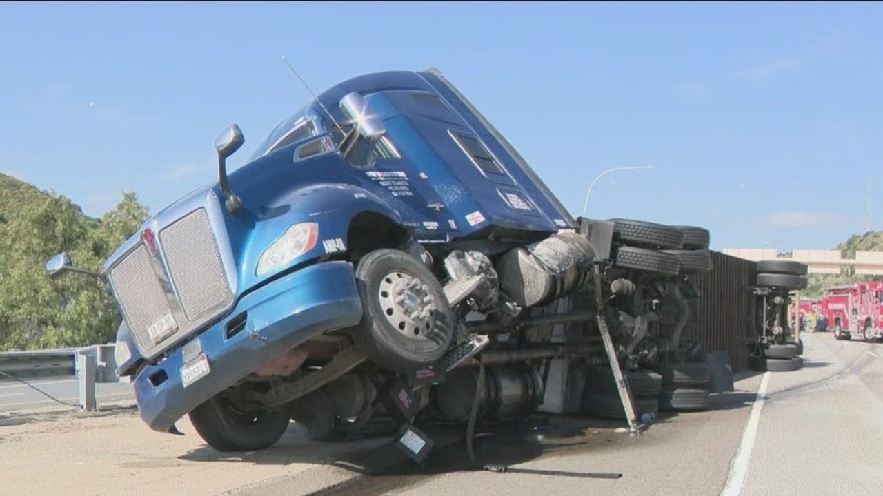 Semi truck overturns on I-15