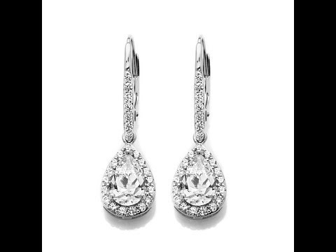 4.25ct Absolute PearShaped and Pav 3Stone Ring