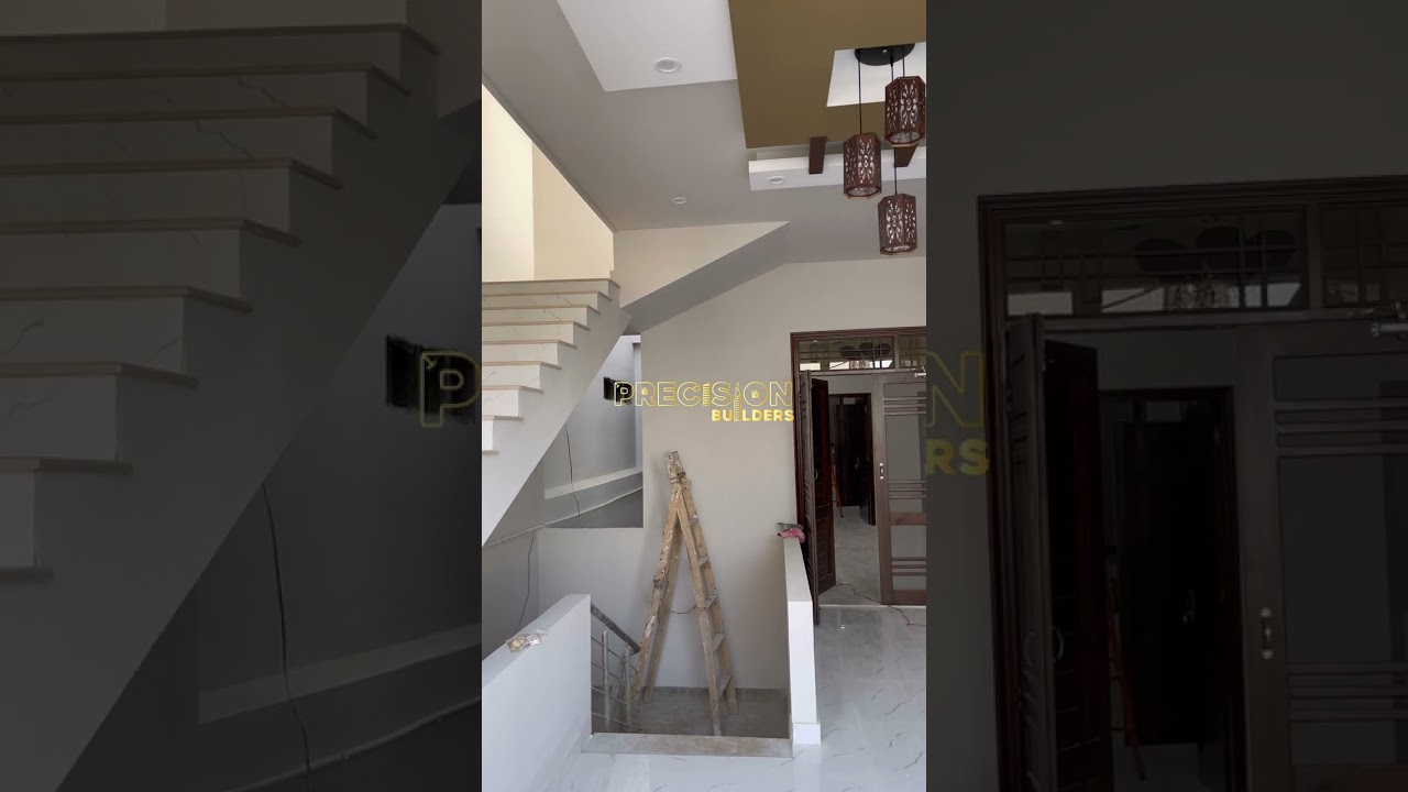 Modern Staircase design & Terrace WIP by Precision Builders.