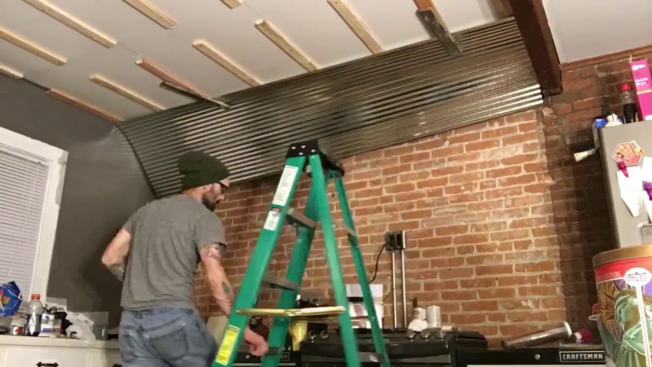 Installing the corrugated steel ceiling