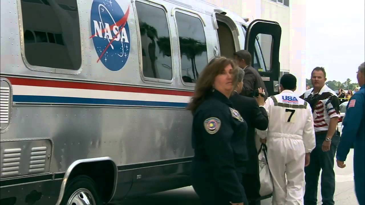 STS-135 Crew Suitup and Walkout