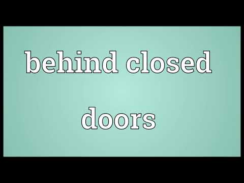 Behind closed doors Meaning