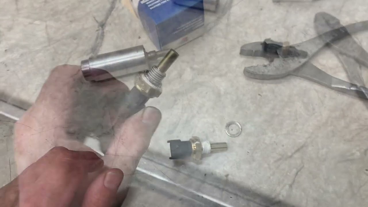 2015 GMC Acadia coolant temperature sensor replace