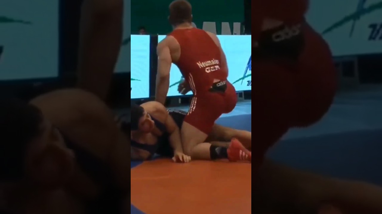 wrestlers singlet rips during match