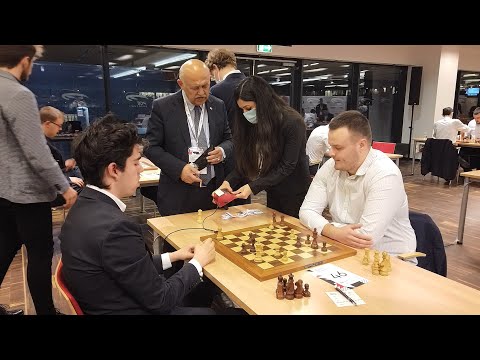 Illegal move (forgetting to queen the pawn) + most viral video in the background