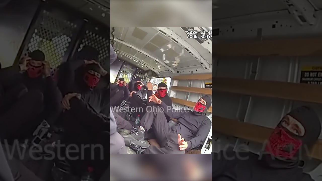 Police Confront Masked Hate Group 👺