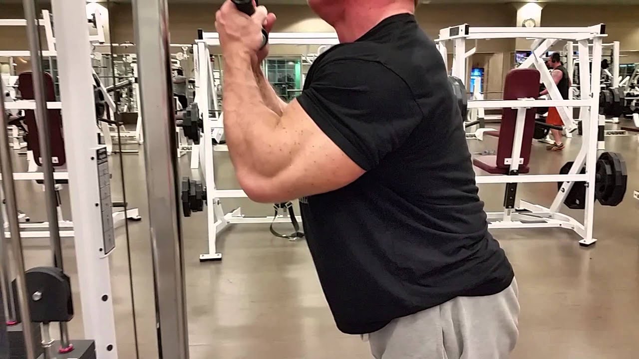 Reverse grip pushdowns for triceps using single handles