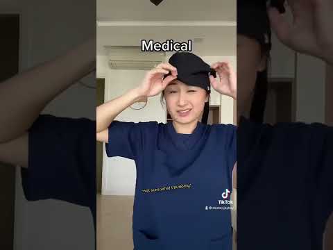 Different doctors in scrub caps
