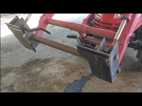 Welded my own quick attach plates, upgrade Mahindra from on loader to skid steer quick attach