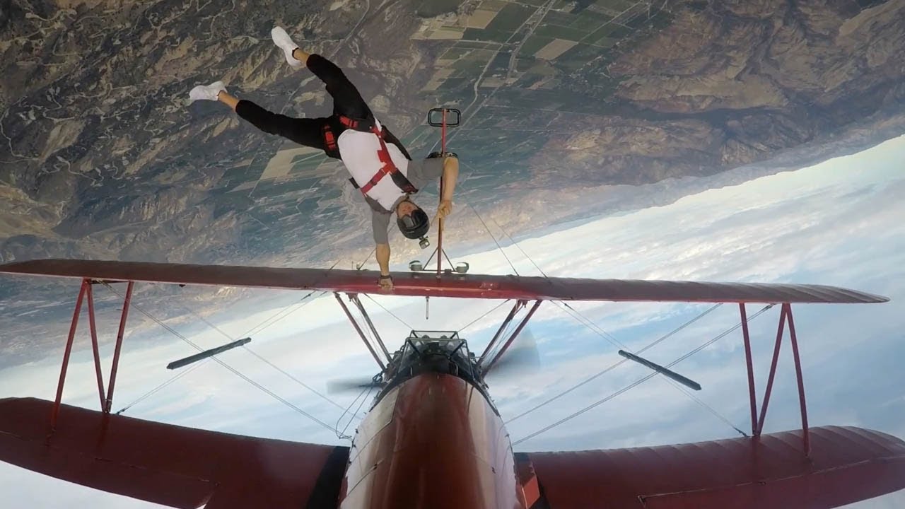 Daredevil Dangles Upside Down From Plane Wing