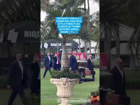 Donald Trump with Eric Trump tonight at Trump National Doral Miami for theLIV Golf Tournament Dinner