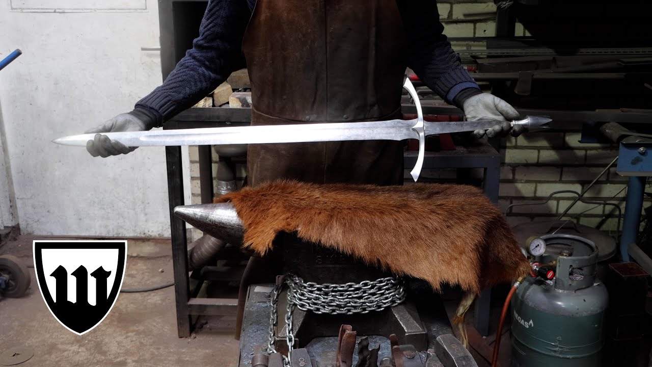 Forging a pattern welded longsword, part 4, making the pommel.
