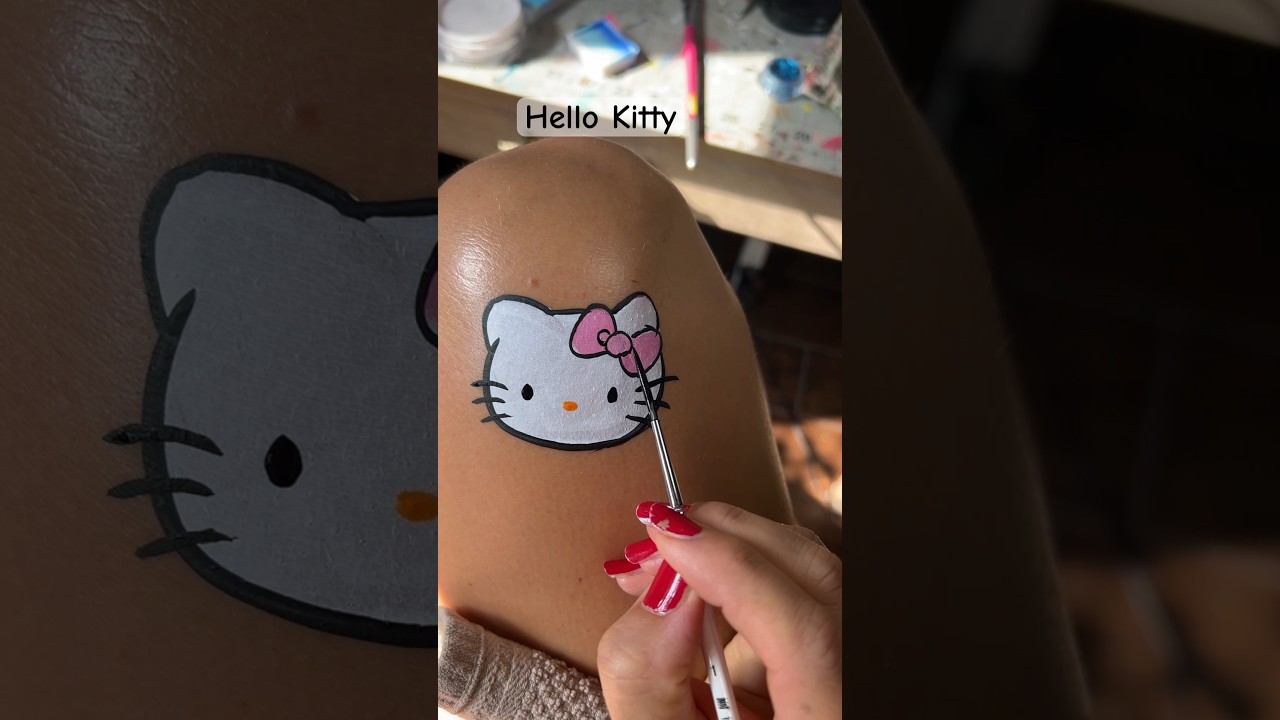 Heres a painting of hello kitty! Hope this brightens your day! #hellokitty #facepaint #facepainting