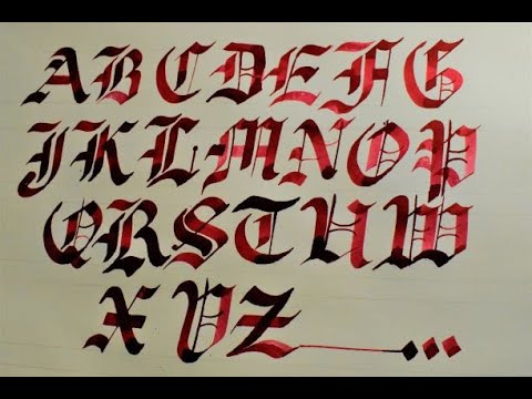 Old English font calligraphy with wooden tool..