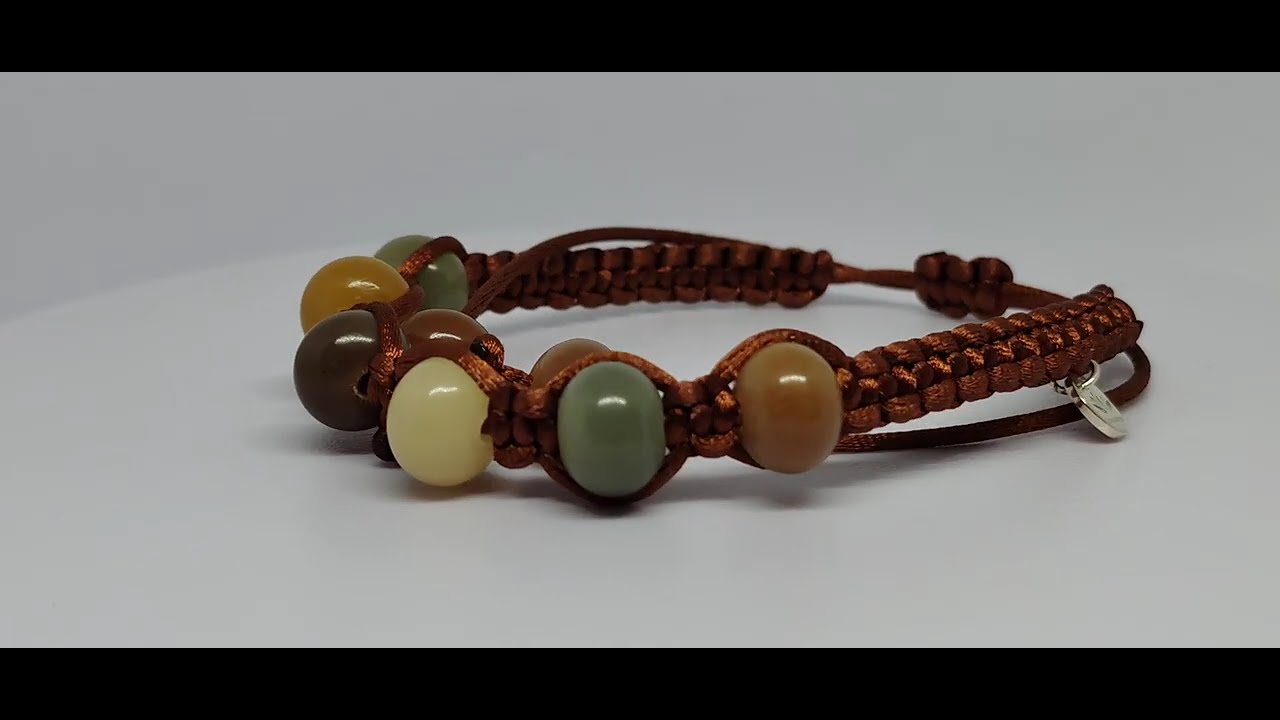 Pulseira sementes de Bohi fio de seda marrom