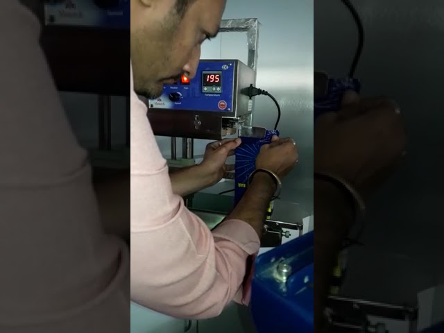 Continuous Bag Sealer - Atta Packing Machine Manufacturer from Rajkot