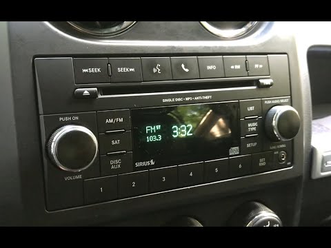 Set the language in Jeep Compass Uconnect 230 Radio.