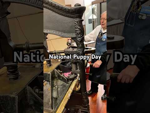 Howard prints a very small cut of a dog for National Puppy Day (March 23)
