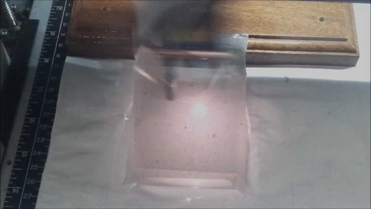 Laser Engraving of the logo on crystal award.