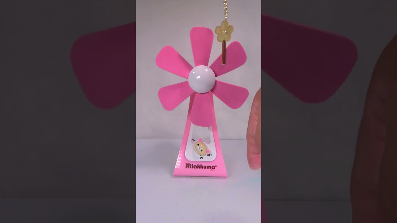 Fan with a flower shaped hair pin attached #kipasangin #shorts #fans