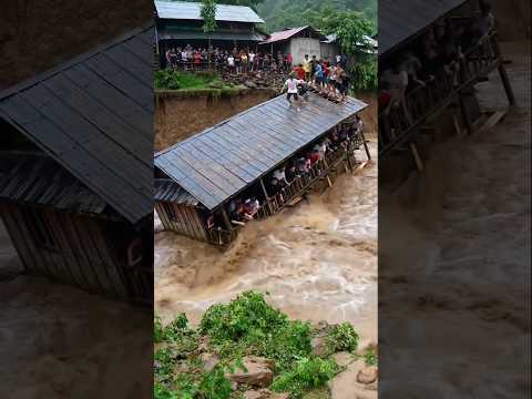 Dozens trapped as river overflows