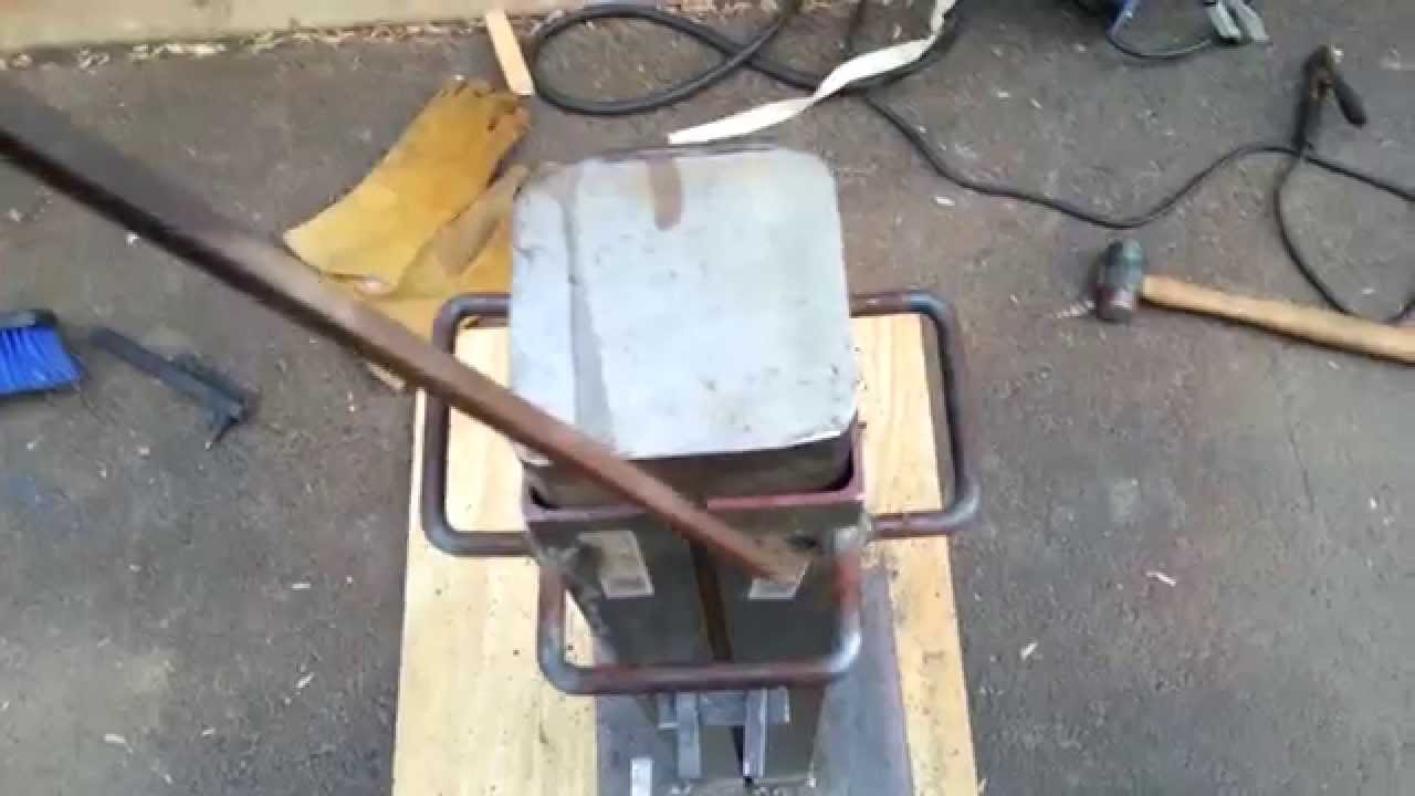 Blacksmithing anvil and stand