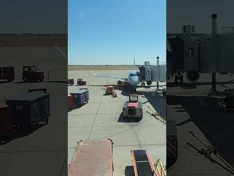 Slow day at MAF Airport in Midland, TX. Pilot and co-pilot both got out and looked the plane over.