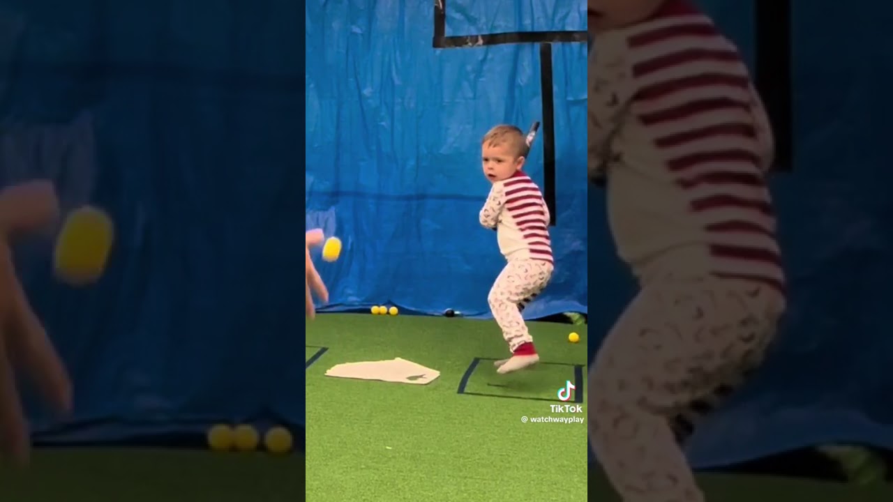 This toddlers baseball swing