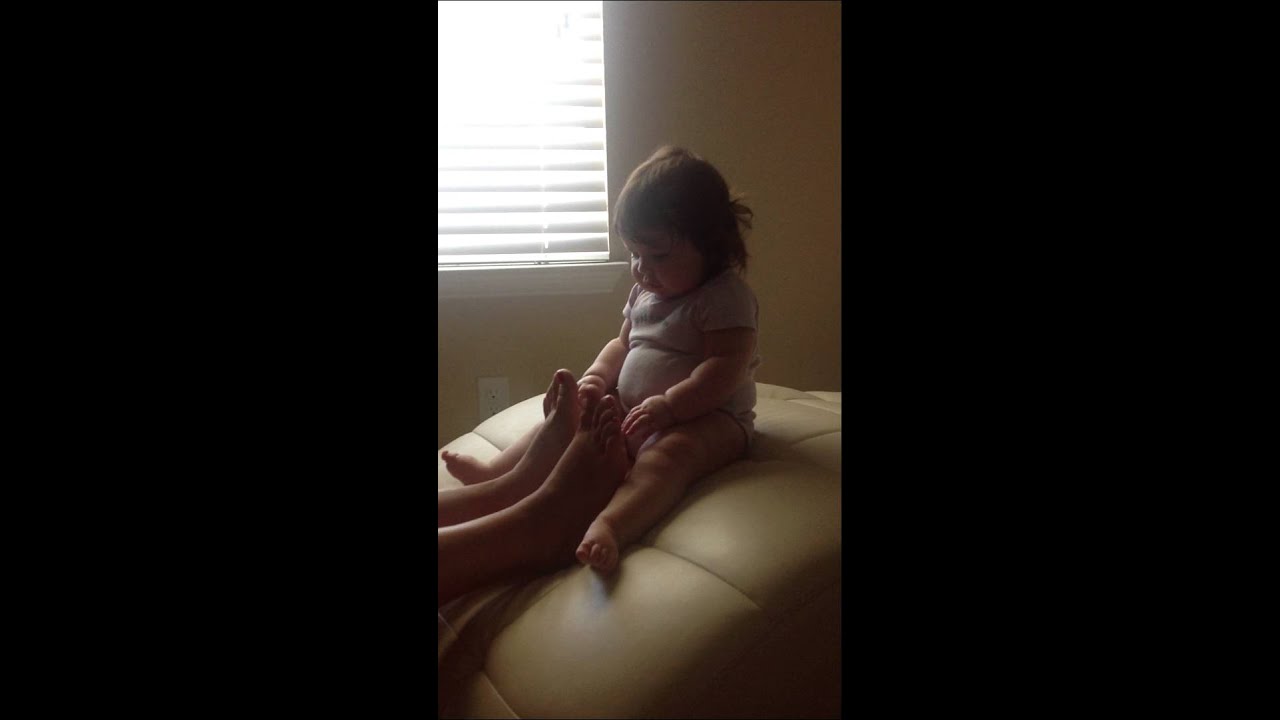 Emma loves Auntie's feet