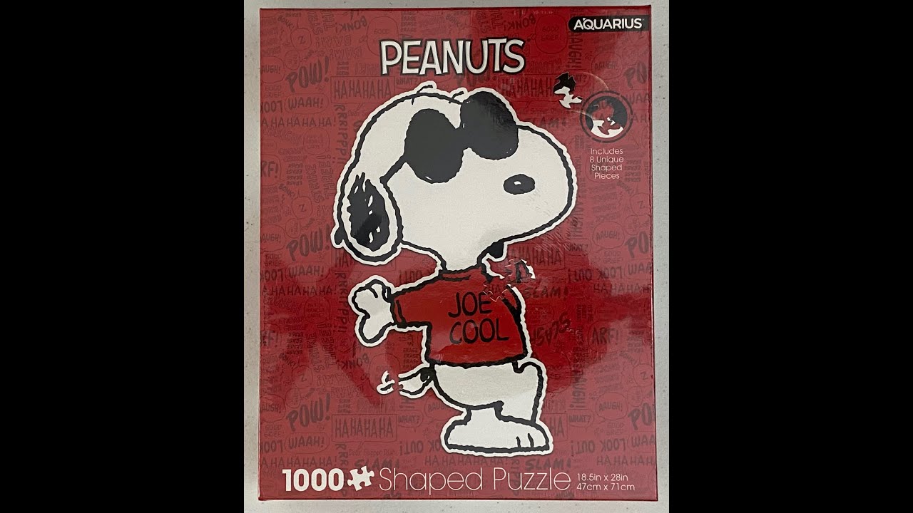 A 1000 piece Joe Cool shaped Peanuts puzzle.