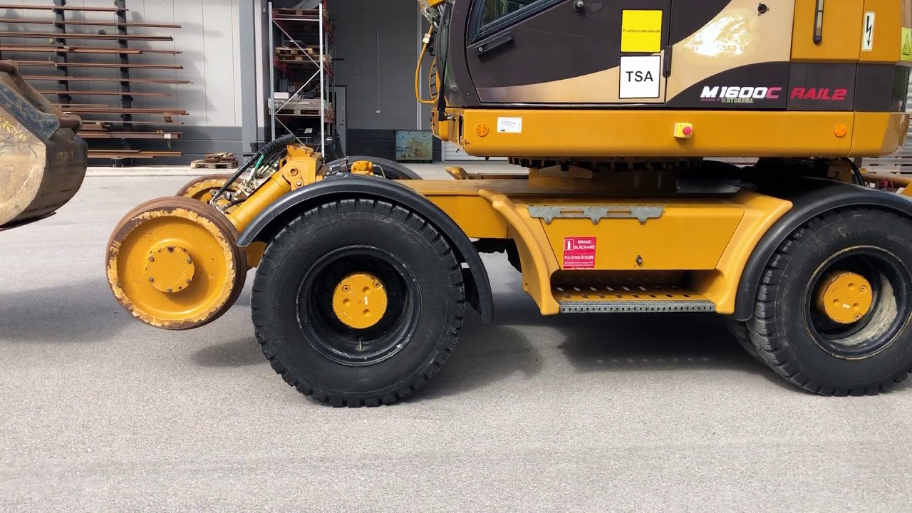 Hjulgrävare Hydrema M1600C Rail2 med flera redskap