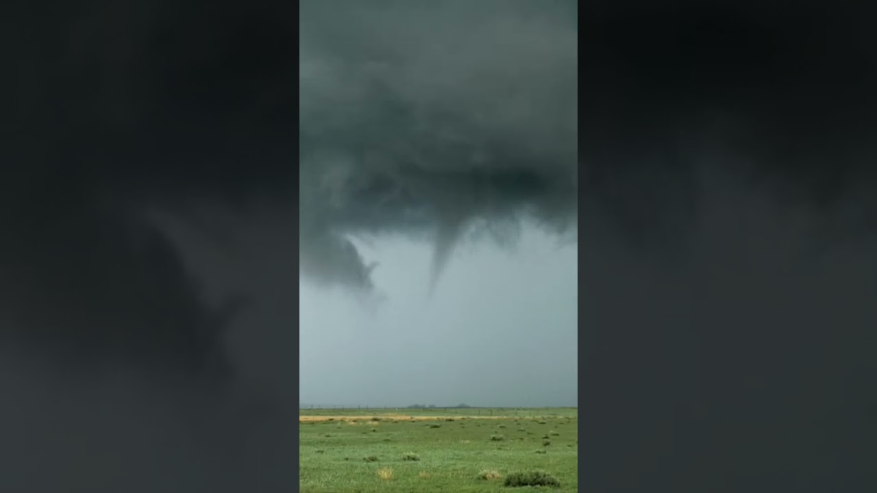 Terrifying funnel cloud descending over Colorado.