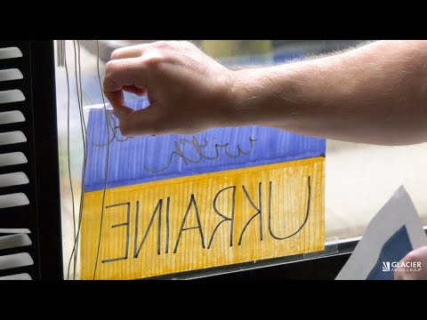 Man ordered to take down Ukrainian flag from his B.C. condo window