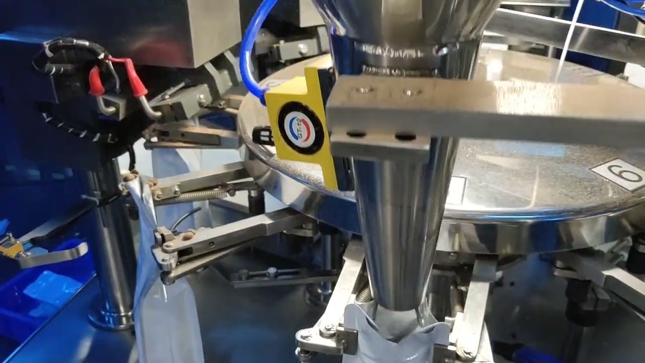 Eight-station +Z elevator for packaging coffee beans