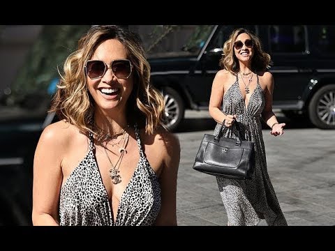 ✅ Myleene Klass stuns in a plunging leopard print maxi dress as she embraces the heatwave on her wa